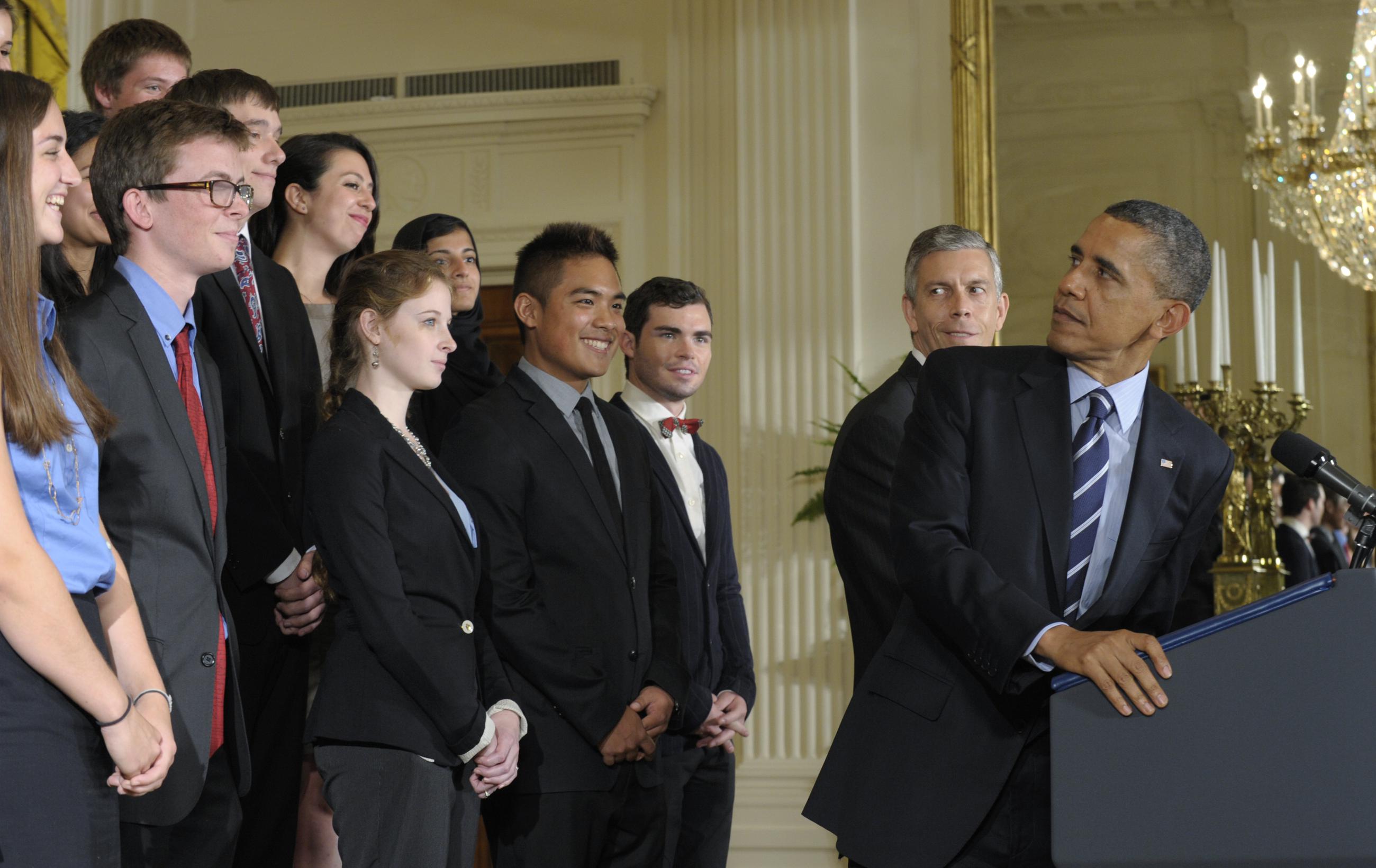 Who Are Those People Standing Behind the President?